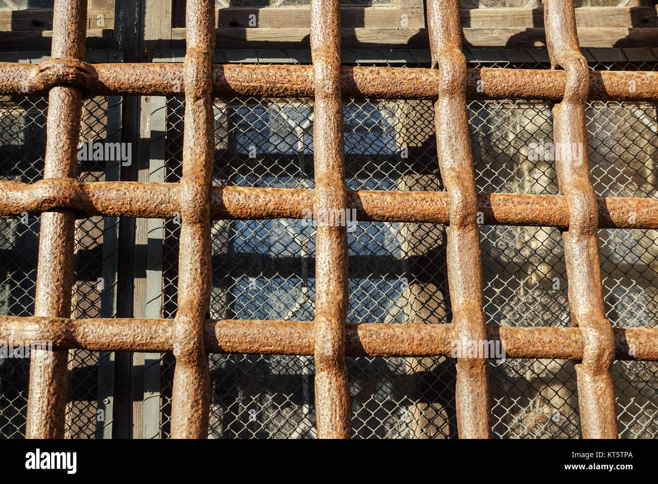 Close up iron bars or metal grating on window or prison cell Stock ...