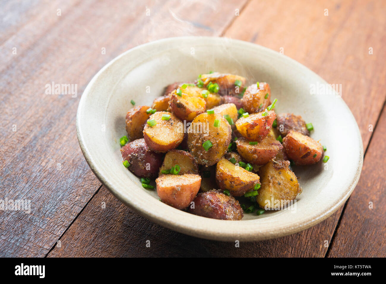 Roasted baby potatoes Stock Photo - Alamy
