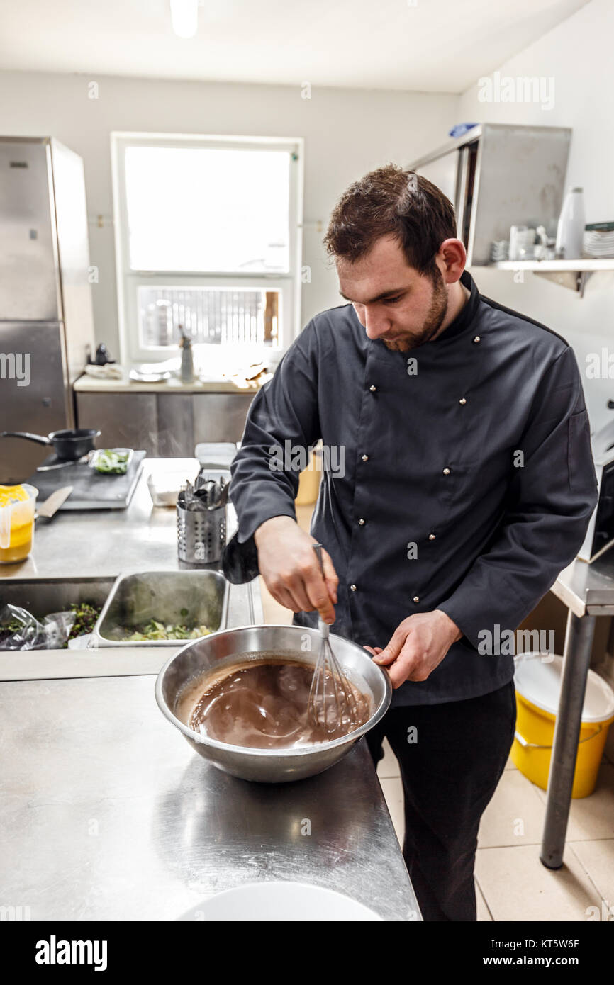 Chef beating butter hi-res stock photography and images - Alamy