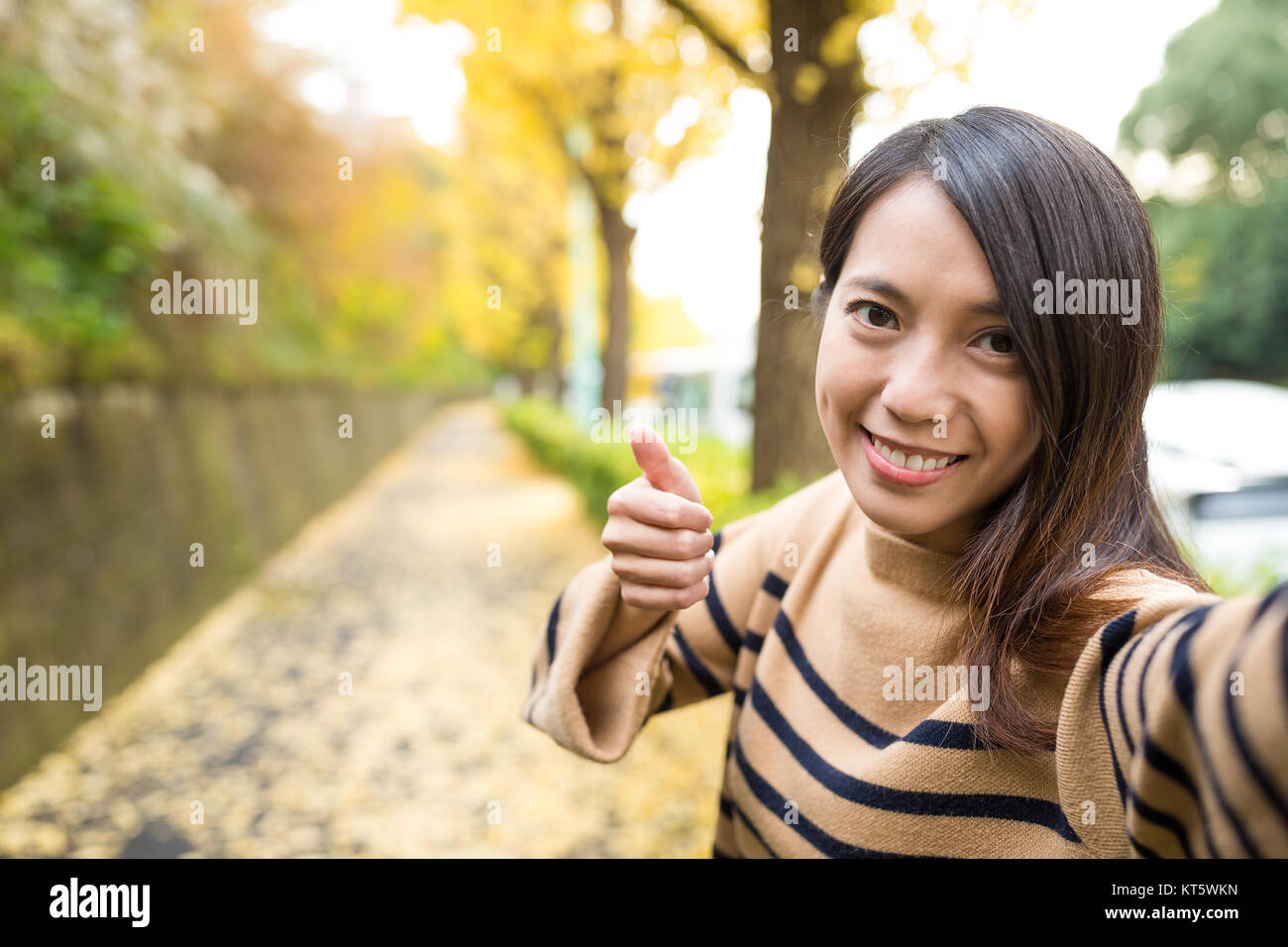 Woman take photo by digital camera Stock Photo - Alamy