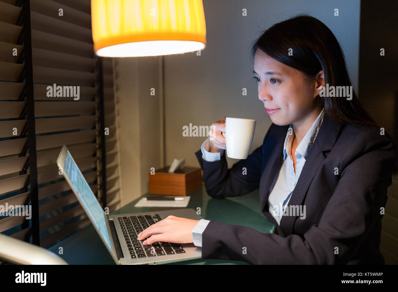 Woman working overnight home hi-res stock photography and images - Alamy