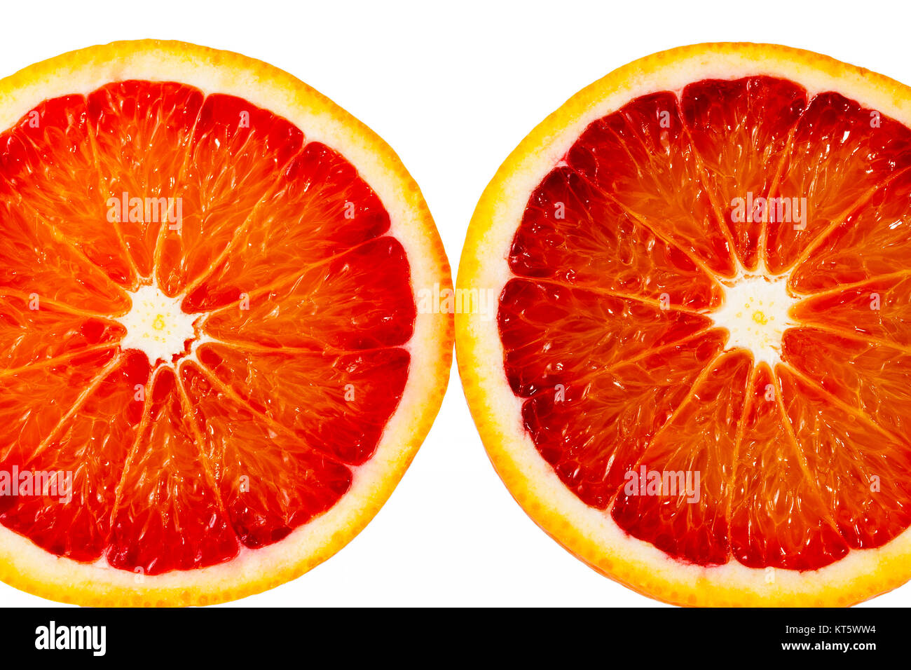 Slices of red orange on white background Stock Photo - Alamy