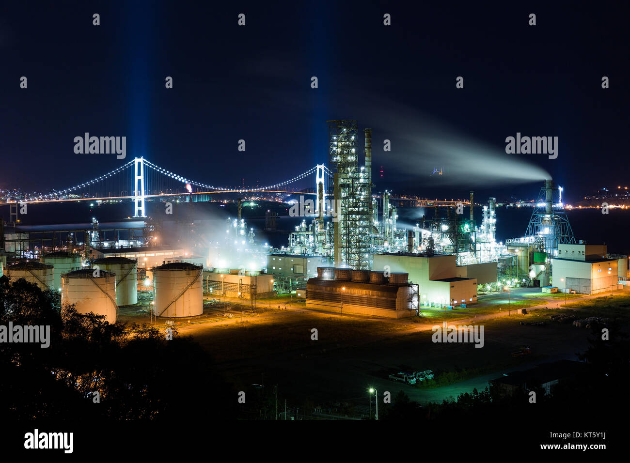 Industrial factory at night Stock Photo - Alamy