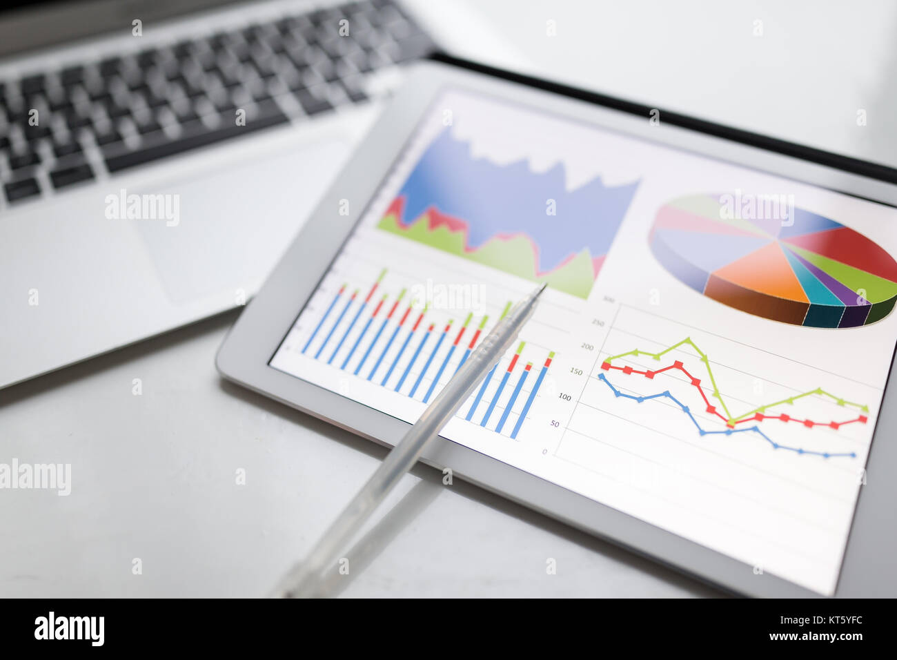 Tablet with chart Stock Photo - Alamy