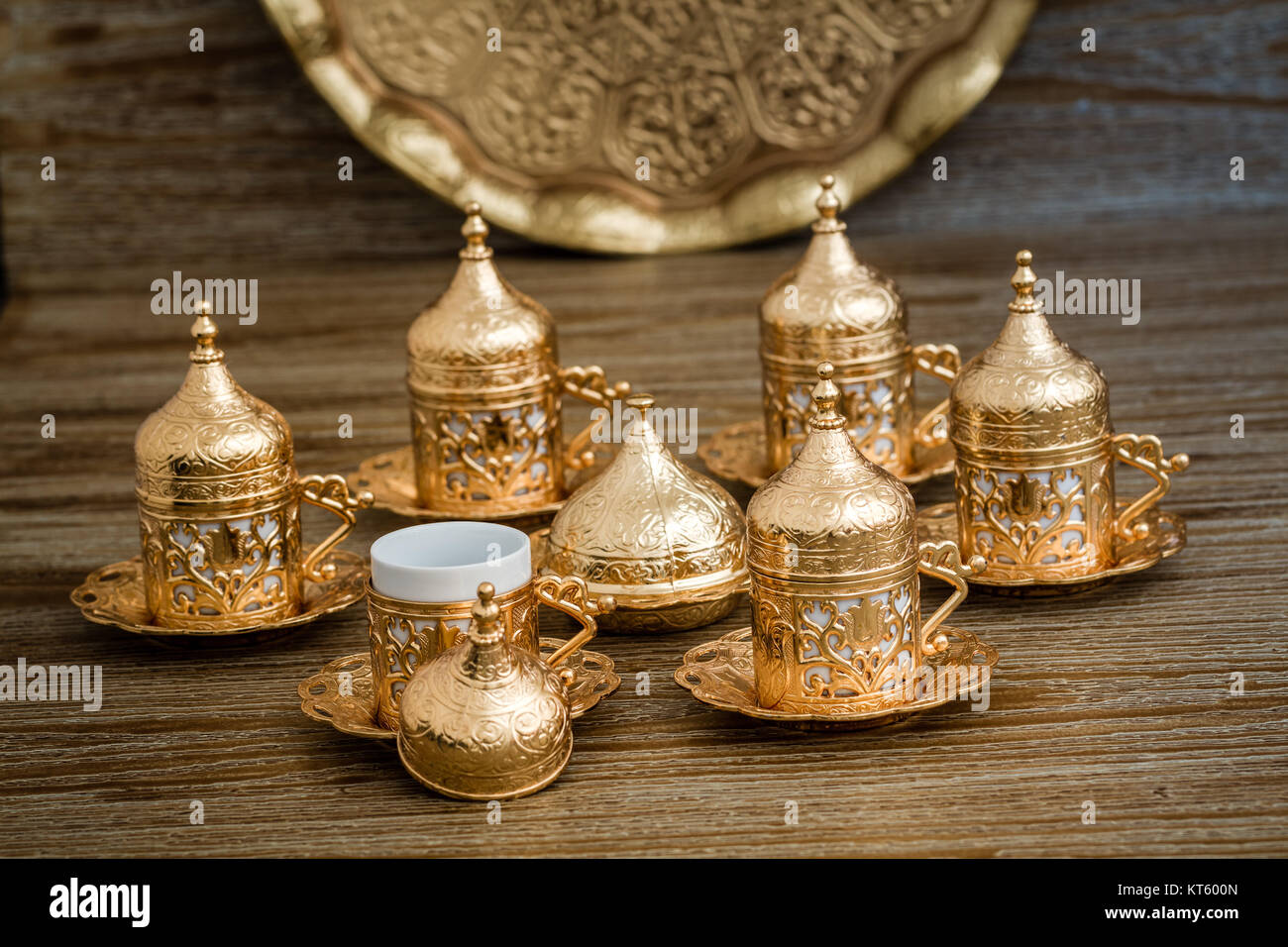 Traditional Golden Coffee Cup Set on Wooden Background Stock Photo - Alamy