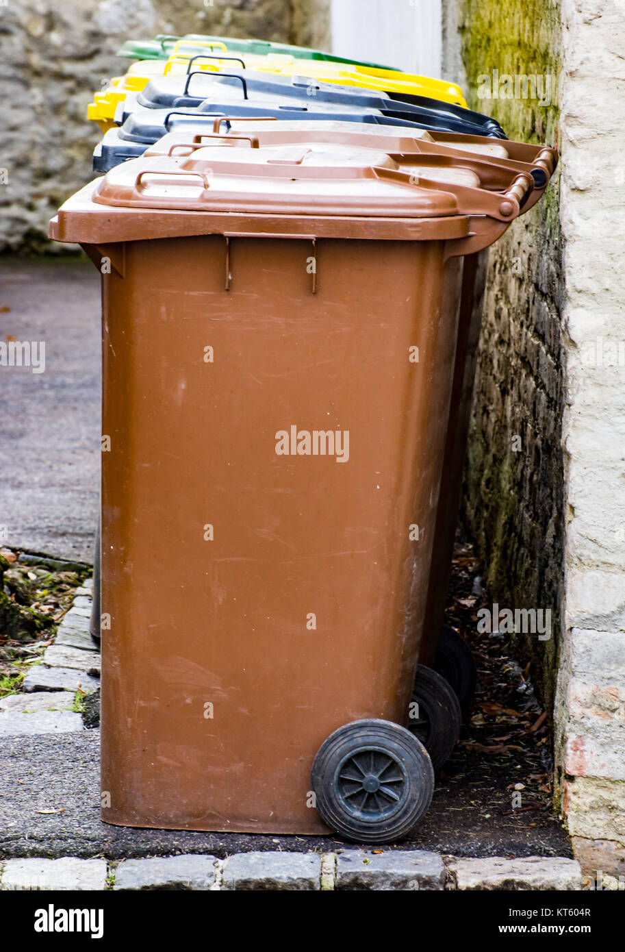Row of garbage cans for waste separation Stock Photo - Alamy