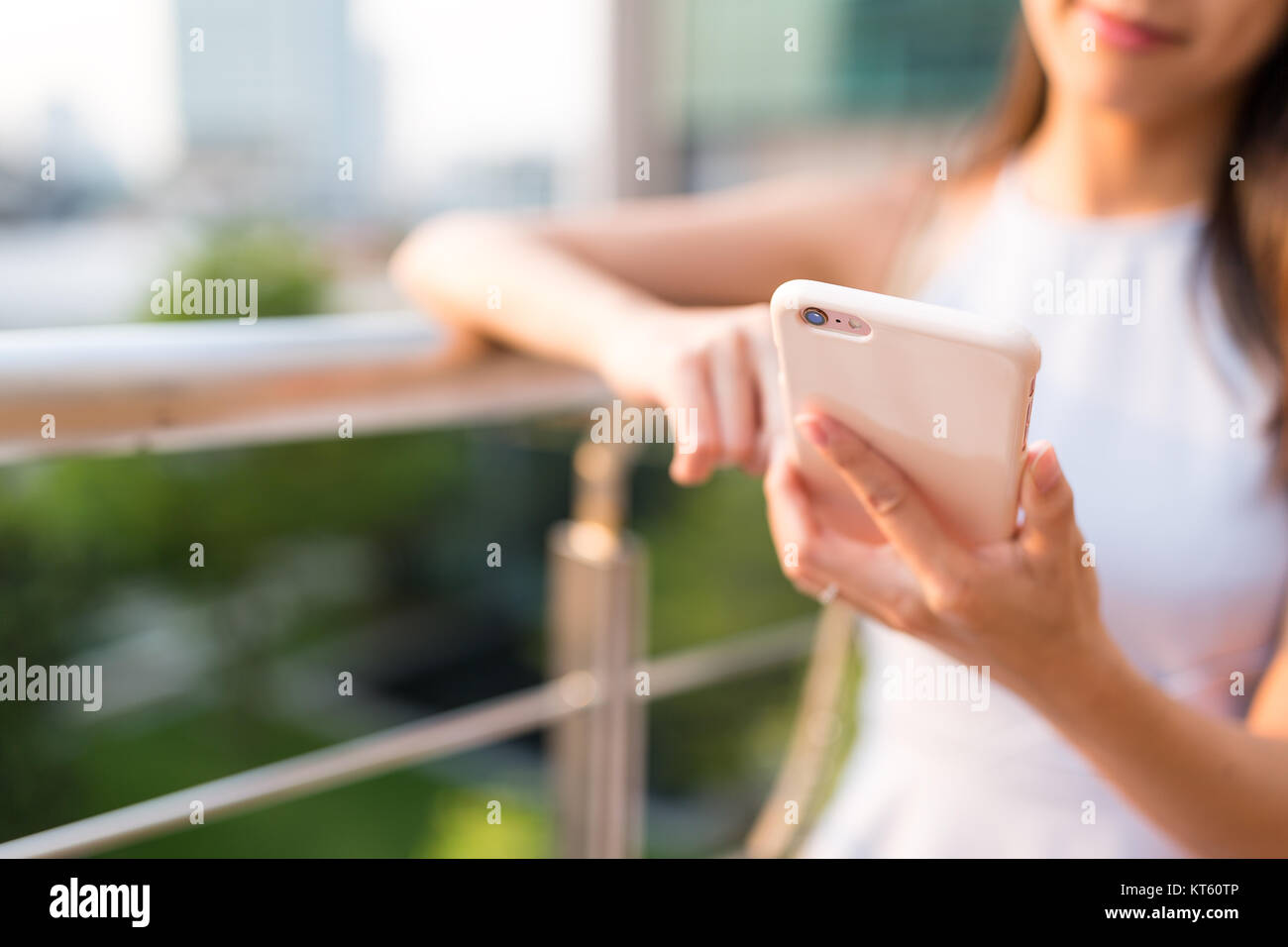 Woman using mobile phone Stock Photo - Alamy