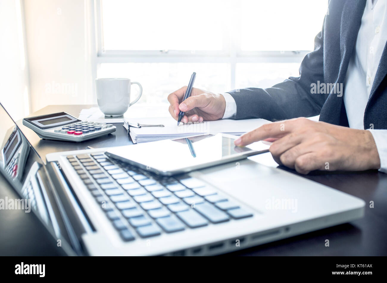 Working process, Man writing on note paper with color pen Stock Photo ...