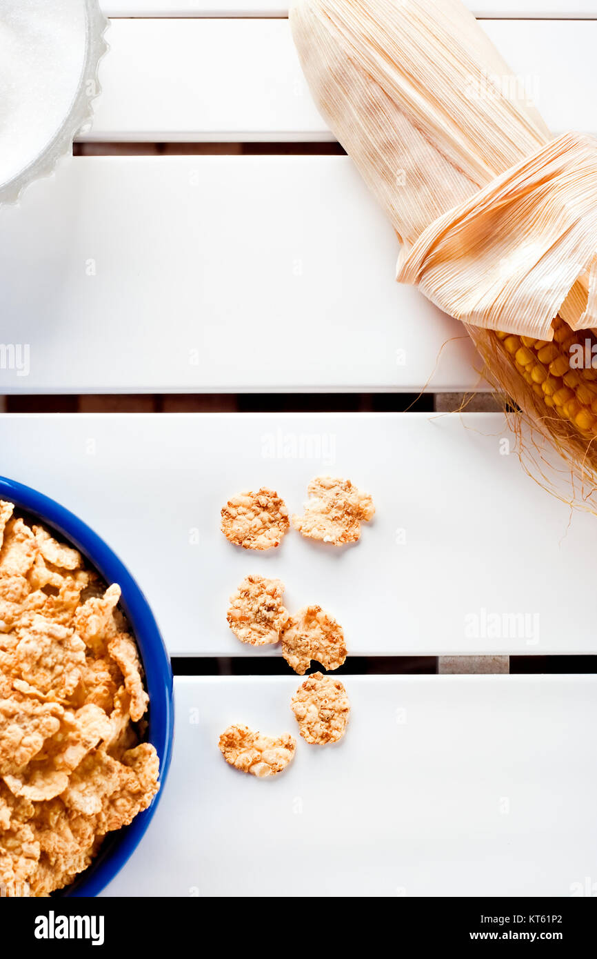 Cornflakes in a blue bowl Stock Photo - Alamy