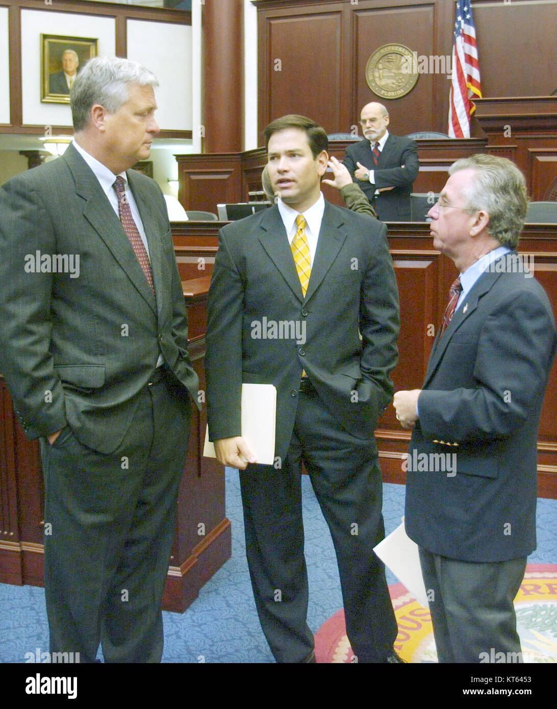 Speaker-designate Rubio stands alongside Speaker Allan Bense during an ...