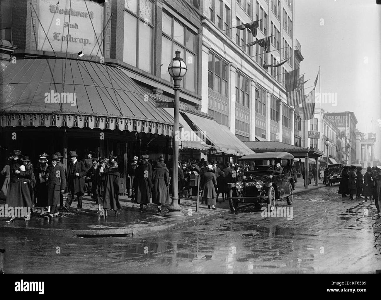 A street scene showcasing the Woodward & Lothrop building, an iconic ...