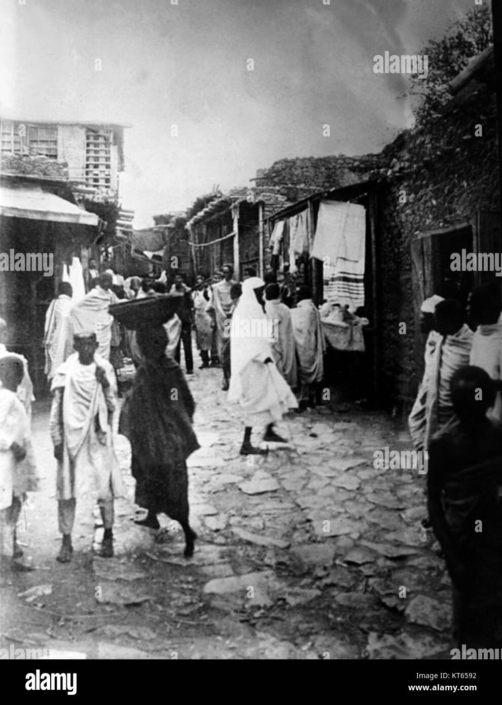 This photograph captures a street scene in Harar, Abyssinia (now ...