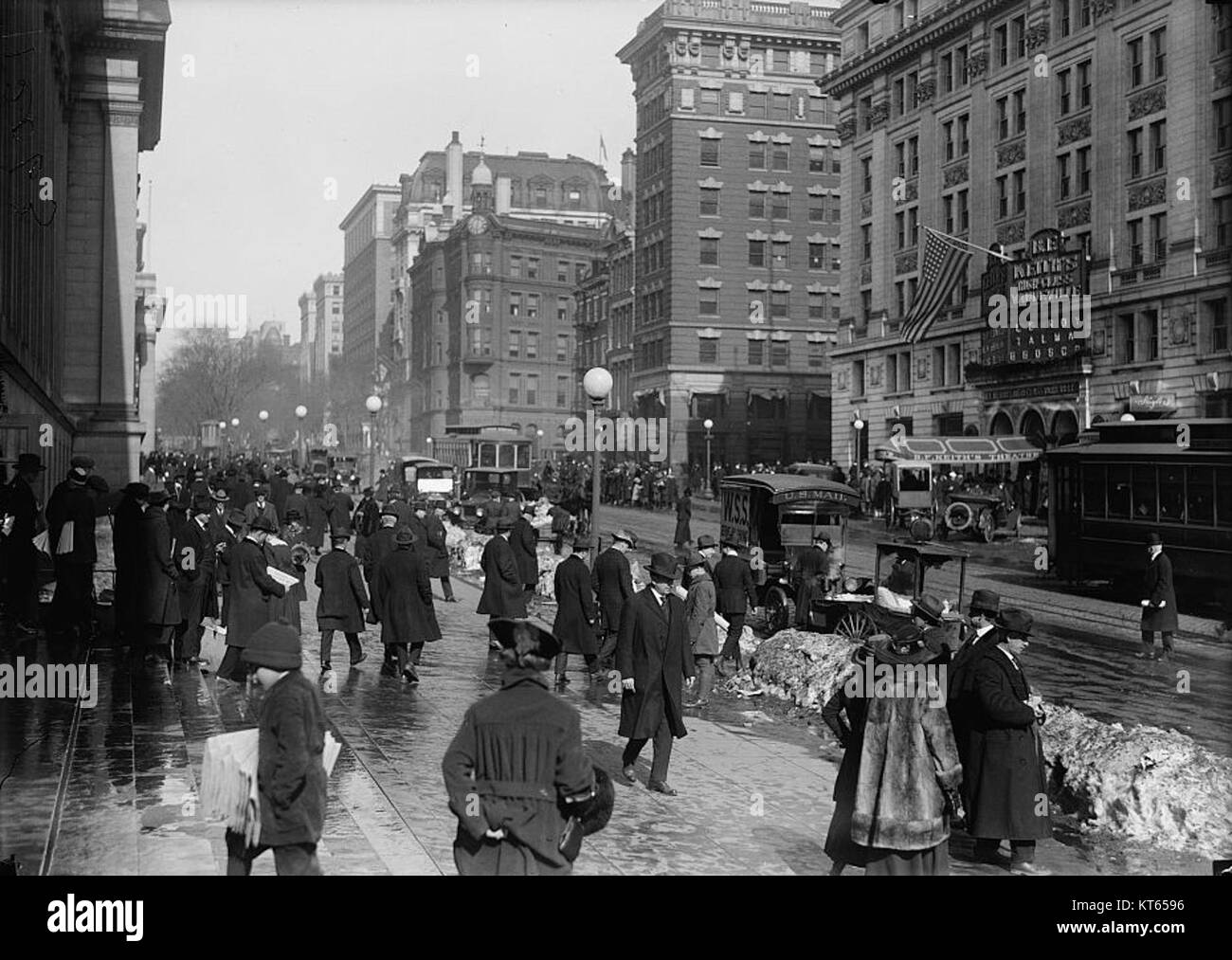 A photograph capturing a street scene adjacent to Keith's Theater ...