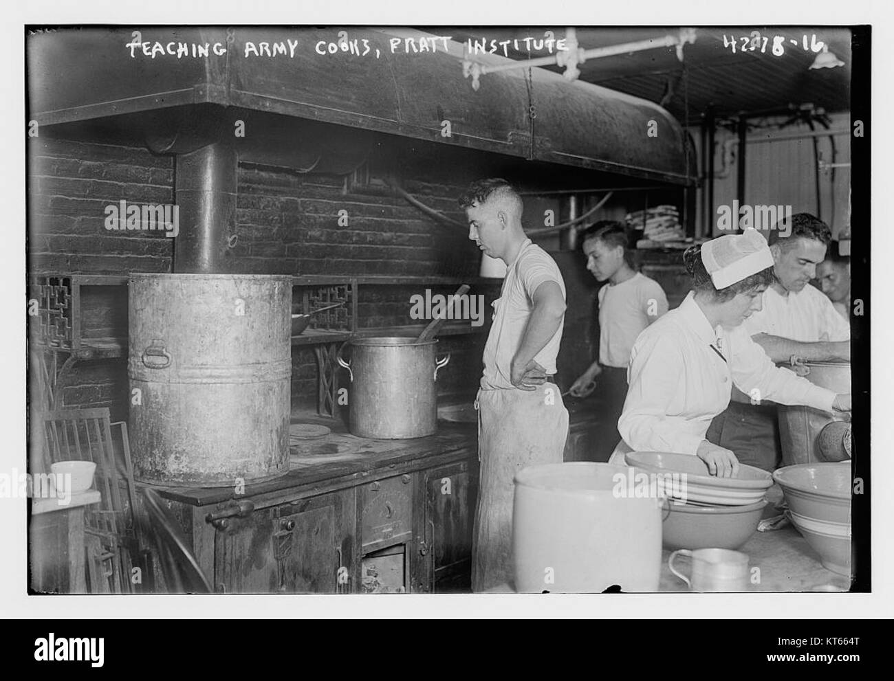 A historical image of army cooks being taught culinary skills at Pratt ...