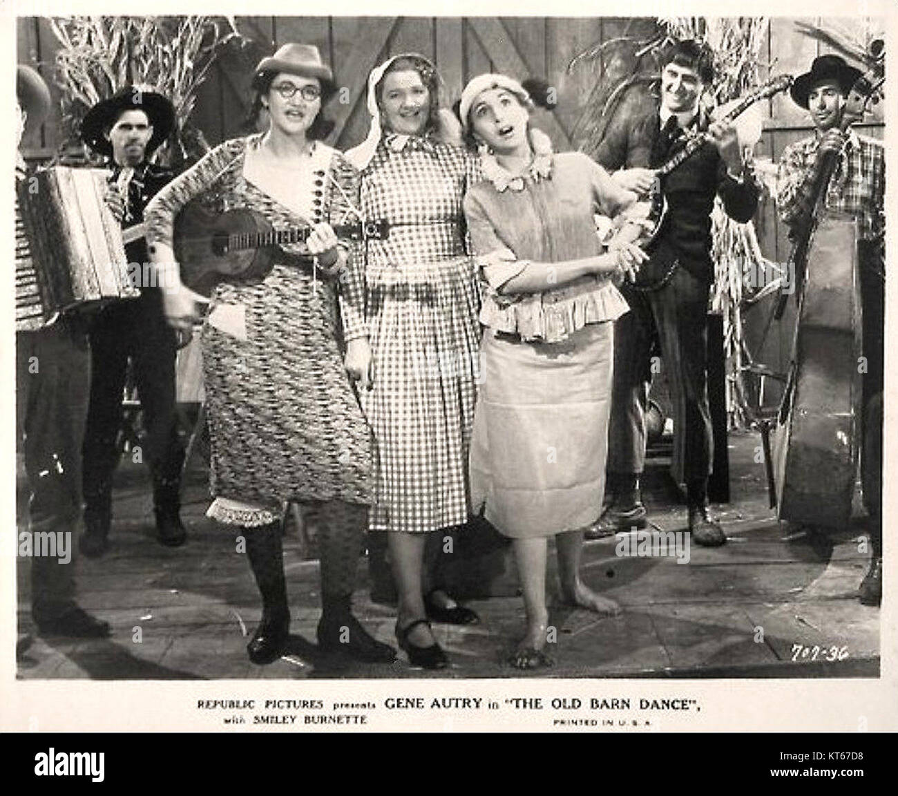 A promotional image for the 1938 film 'The Old Barn Dance,' a musical ...
