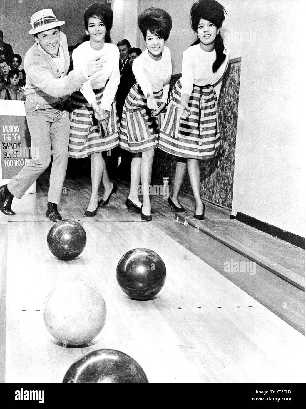 The Ronettes, an iconic American girl group, are featured in this image ...