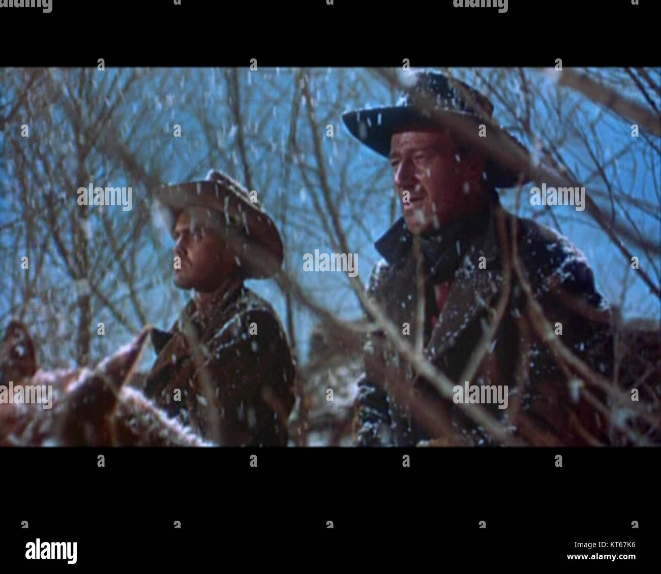 A screenshot from the Ford trailer for 'The Searchers' (1956), a ...