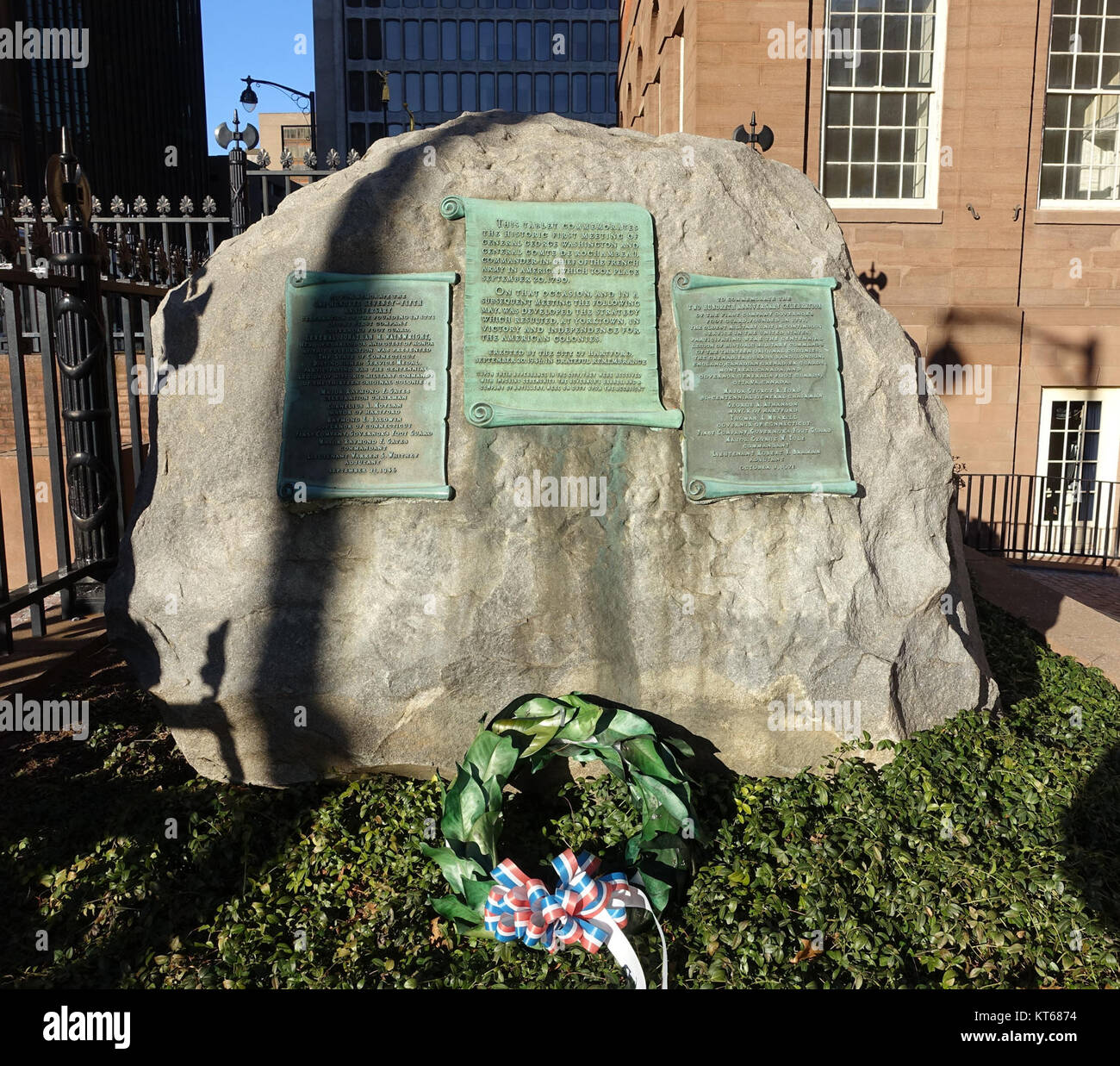The photograph titled 'Three Commemorations' captures a historical ...