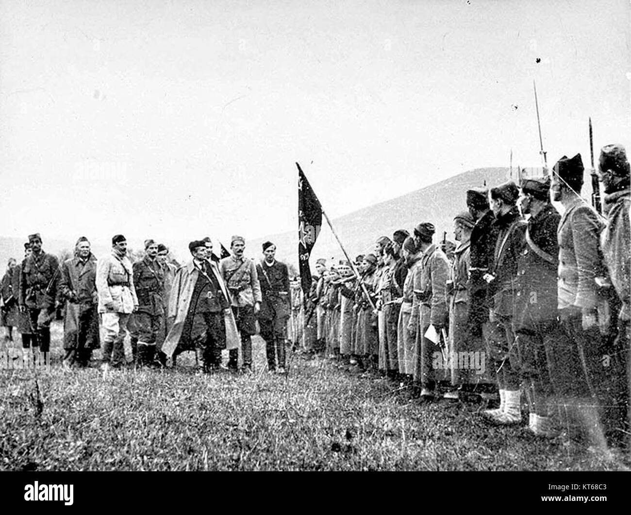 A historical image showing Josip Broz Tito handing over the flag to the ...