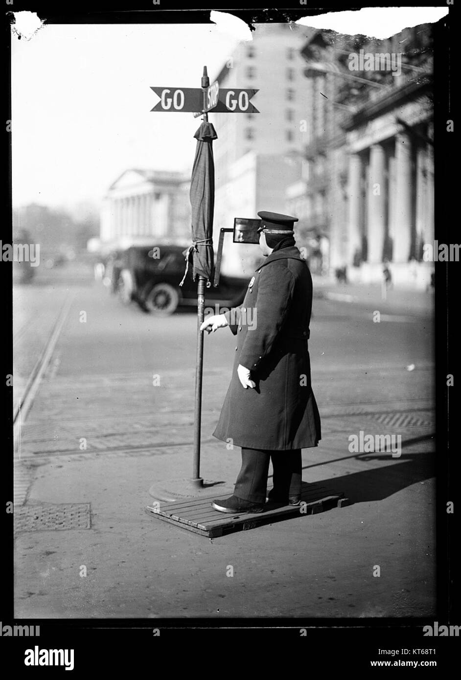 A traffic officer in Washington, D.C., managing traffic at a busy ...