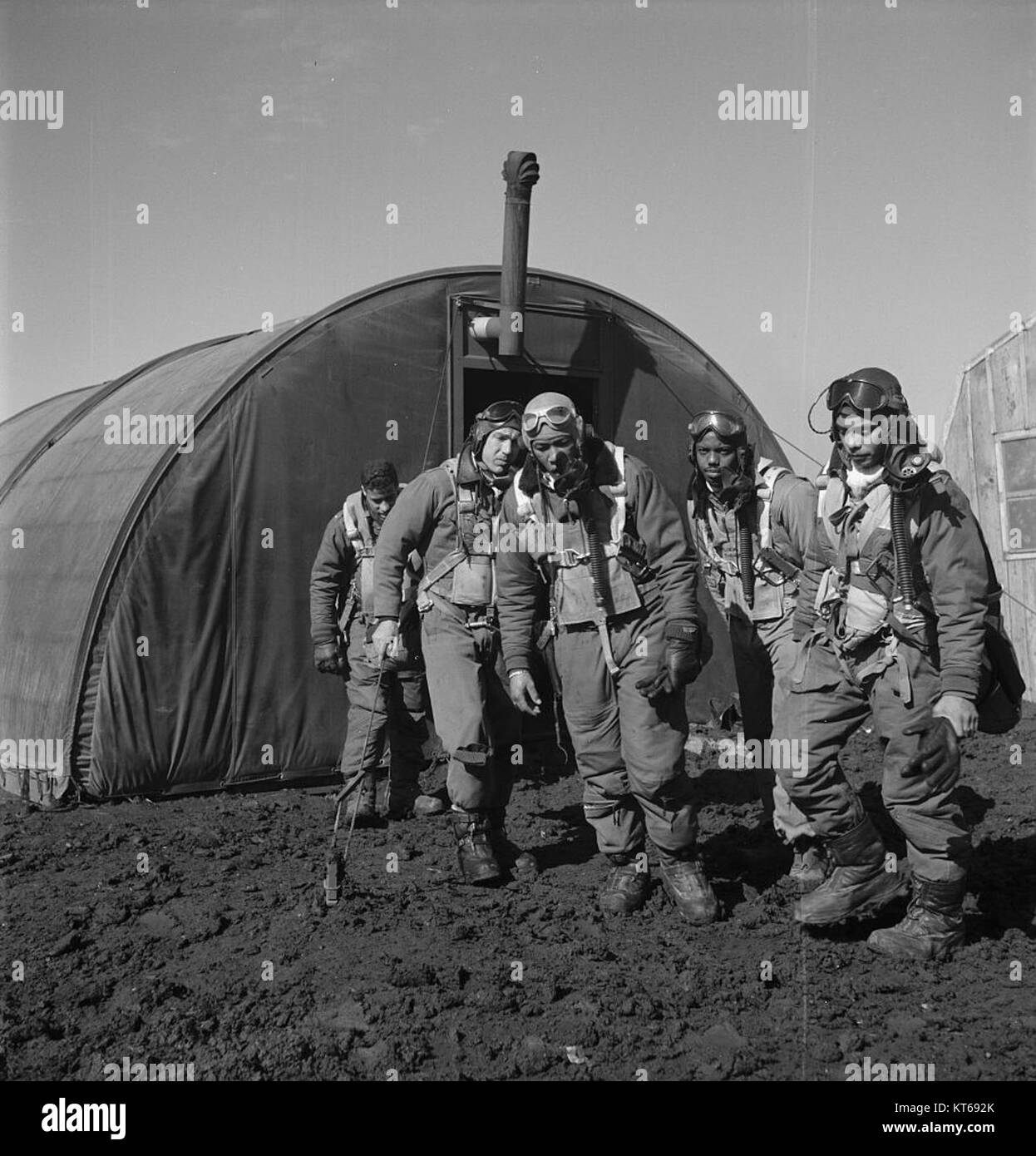 This photograph captures the Tuskegee Airmen, the first African ...