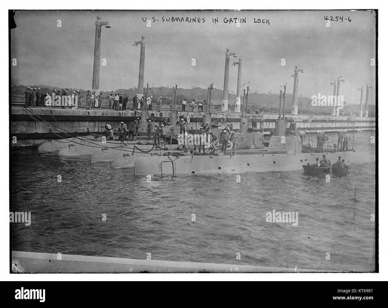 This photograph shows U.S. submarines passing through the Gatun Lock in ...
