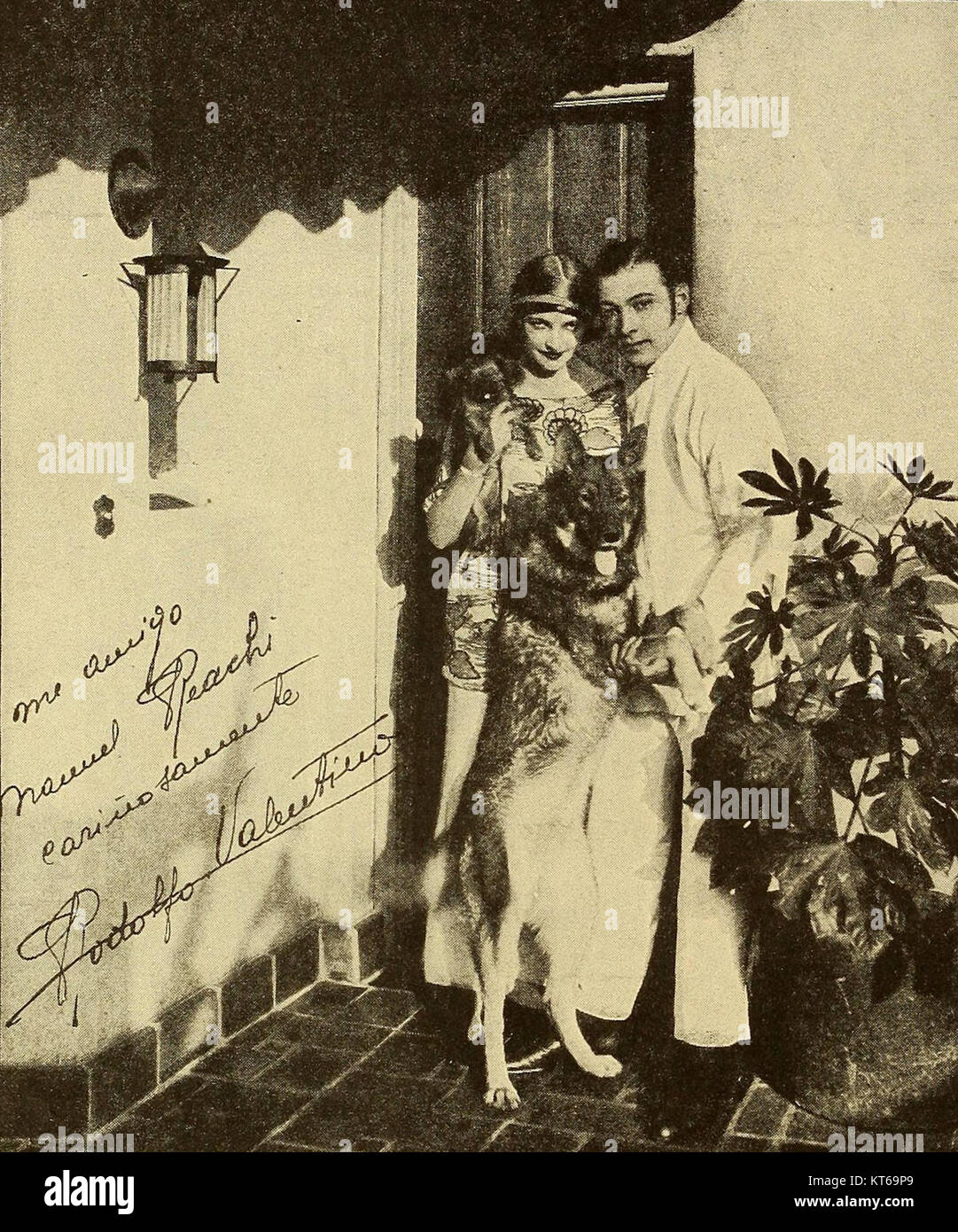 Valentino at home with Natacha Rambova and their dog Stock Photo - Alamy