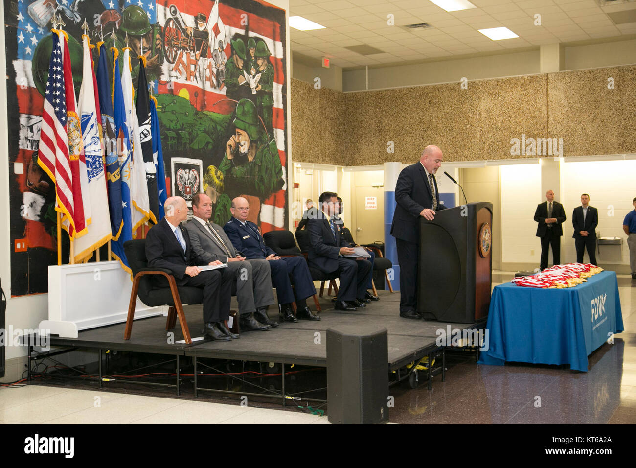An image capturing a veterans award ceremony, identified by code Kb ...