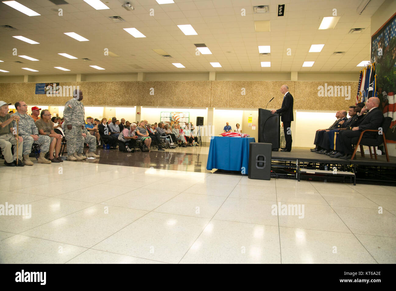 This image shows a veterans' award ceremony, recognizing individuals ...