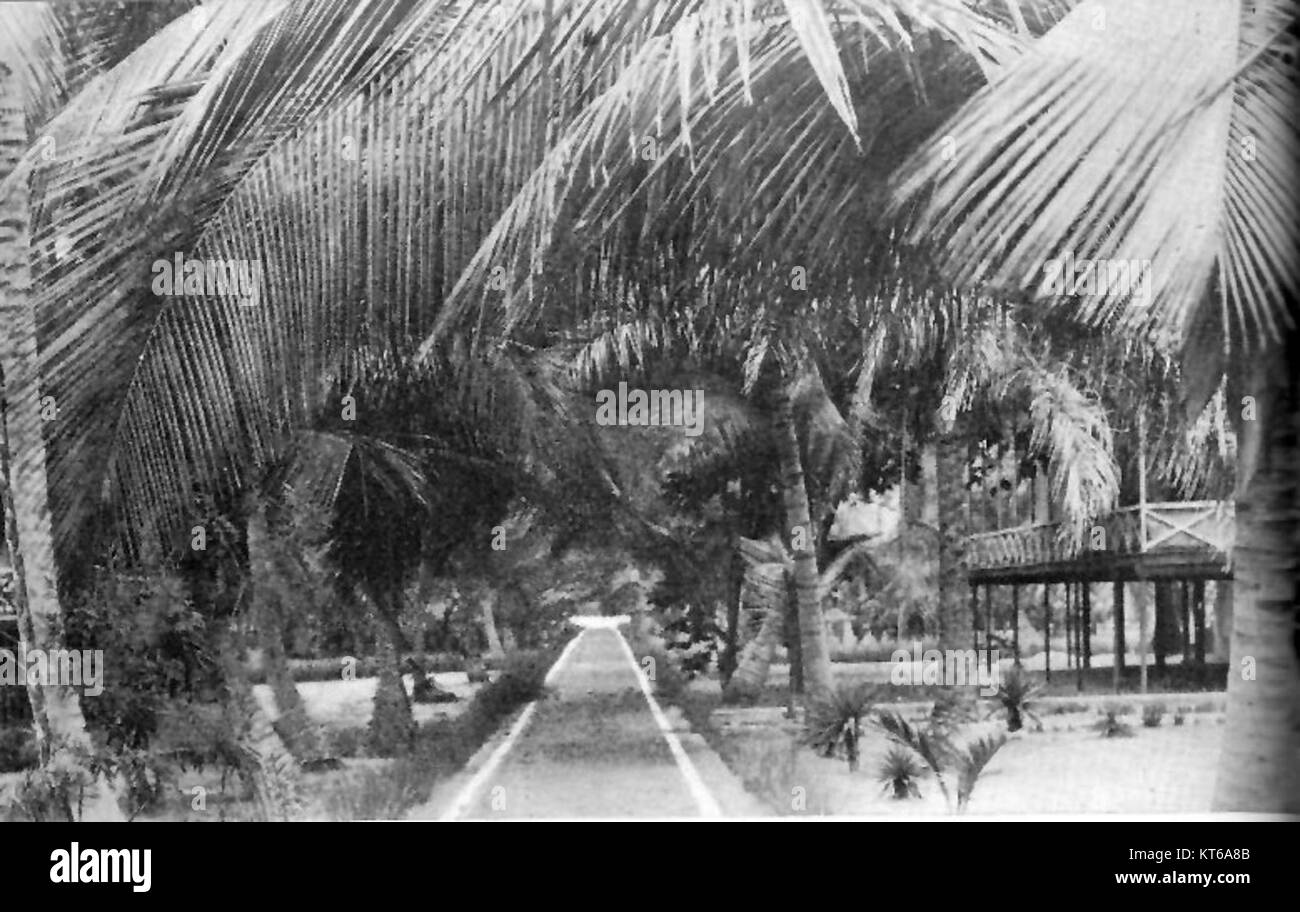 A village street in the Belgian Congo depicts a scene from the early ...