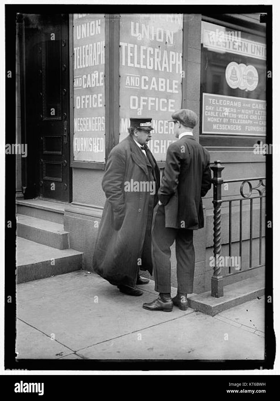 This image shows a Western Union office between 1913 and 1917, a period ...