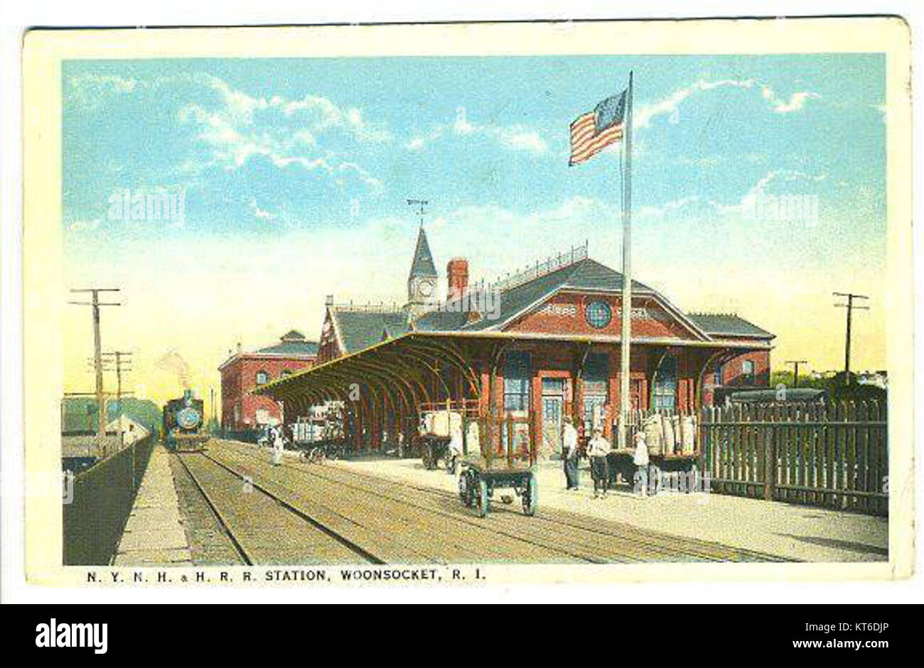 A historical postcard depicting the Woonsocket Station, located in ...