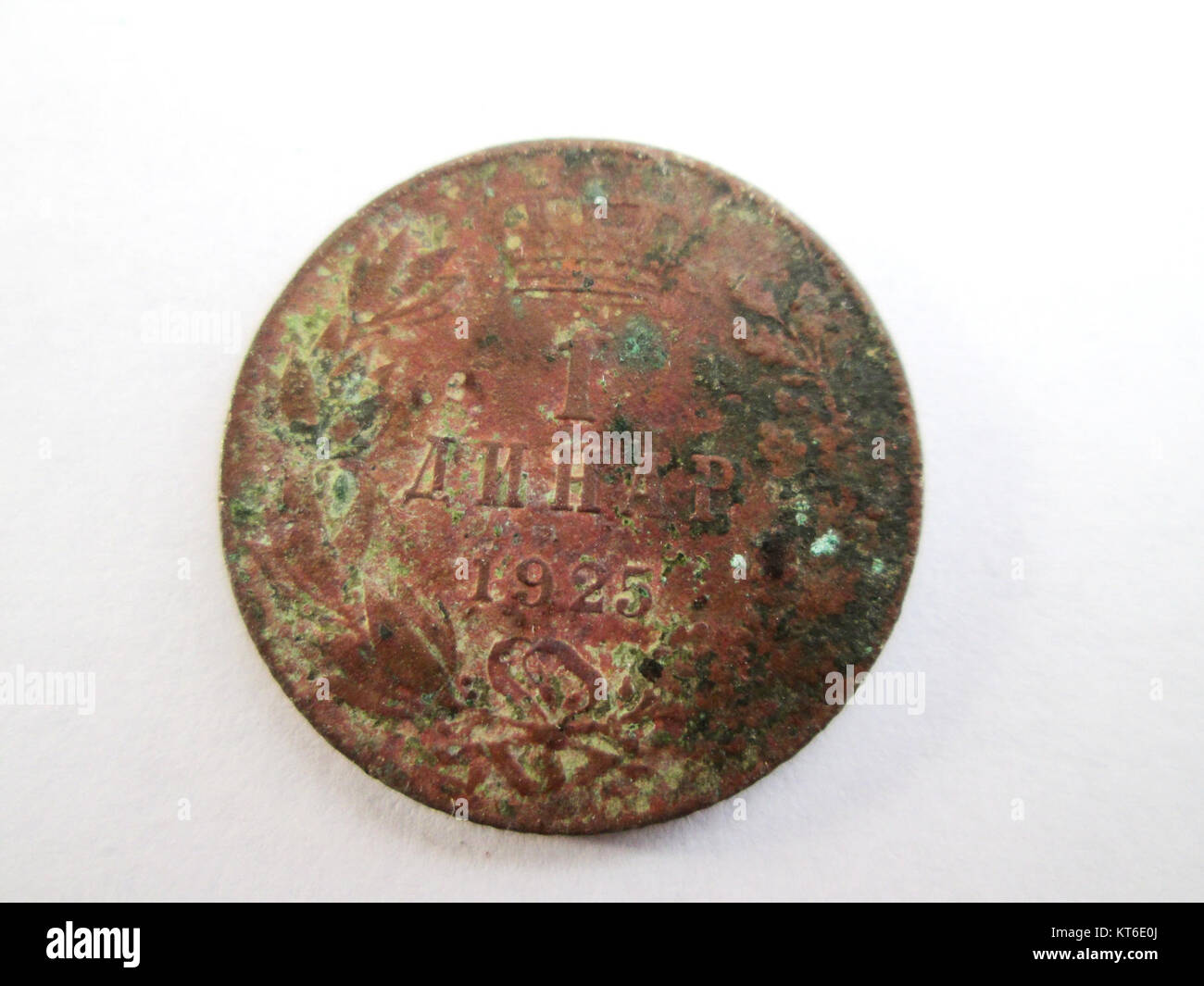 This is a Yugoslavian 1 Dinar coin from 1925, featuring the image of ...