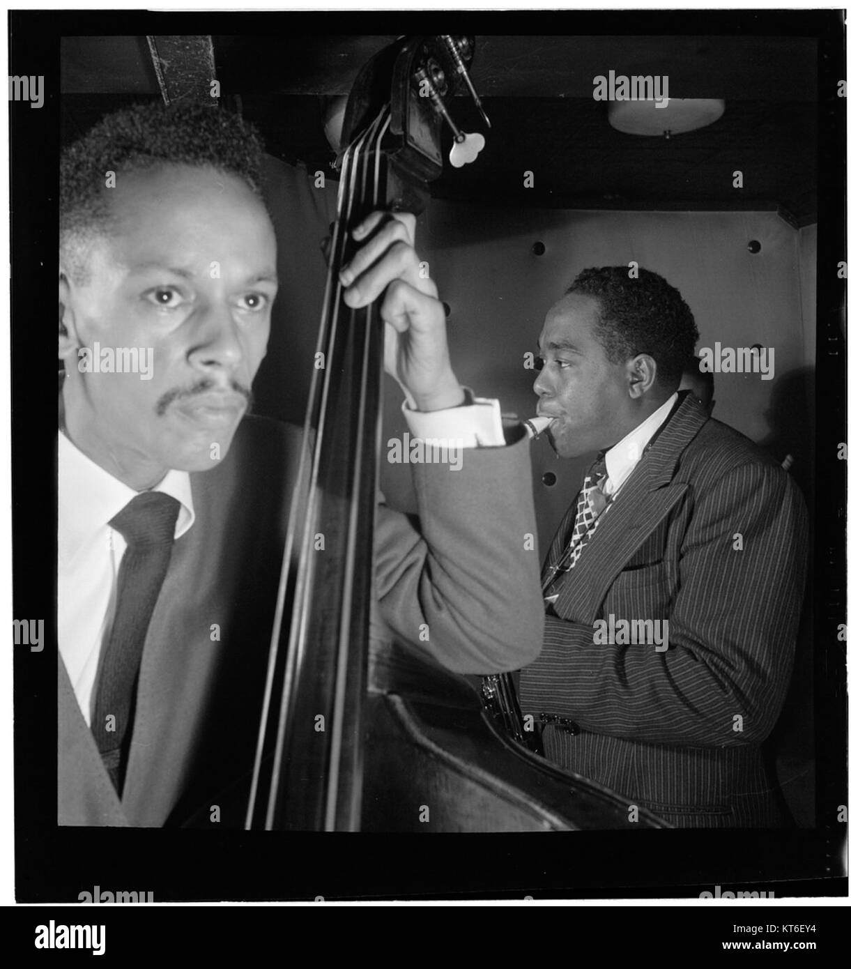 This iconic portrait captures jazz musicians Charlie Parker, Tommy ...