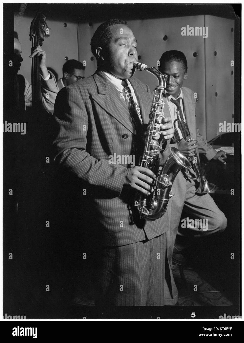 This photograph features jazz musicians Charlie Parker, Tommy Potter ...