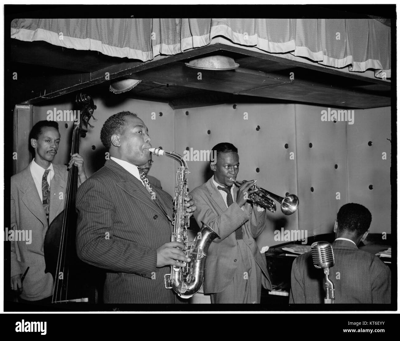 This portrait features jazz musicians Charlie Parker, Tommy Potter ...