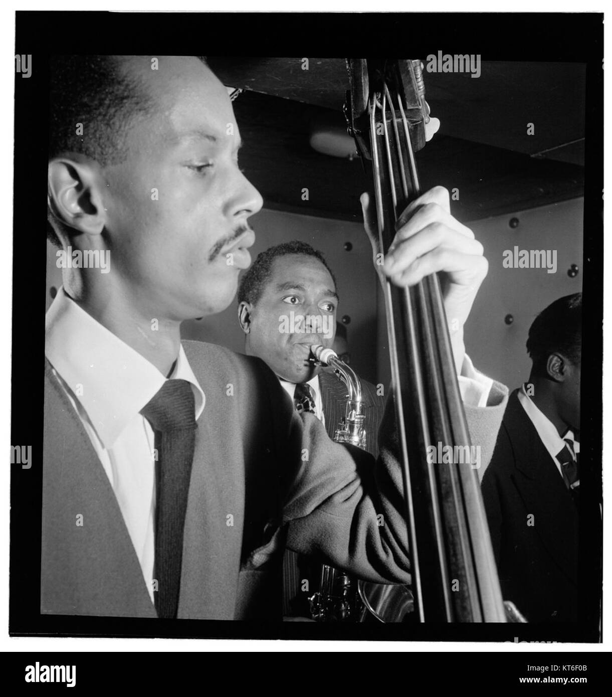 This photograph captures jazz legends Charlie Parker and Tommy Potter ...
