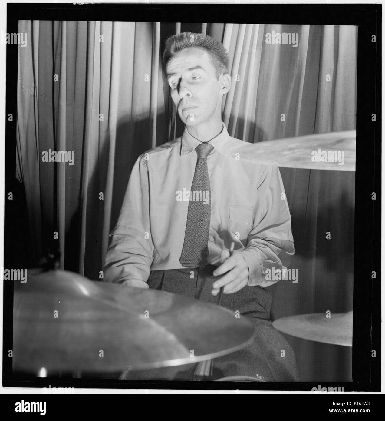 This portrait captures jazz drummer Dave Tough performing at Eddie ...