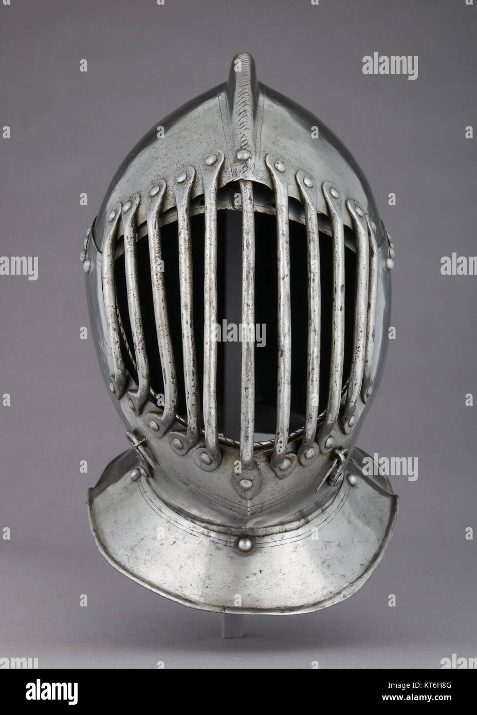 This armet, a type of helmet from the 15th century, features a rounded ...