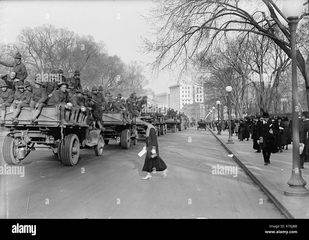 This image captures U.S. Army soldiers traveling through a city, either ...