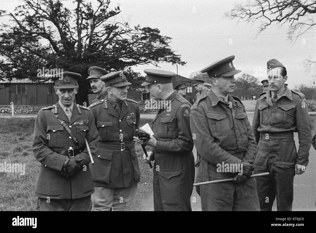 This historical photograph depicts Dutch and English military officers ...