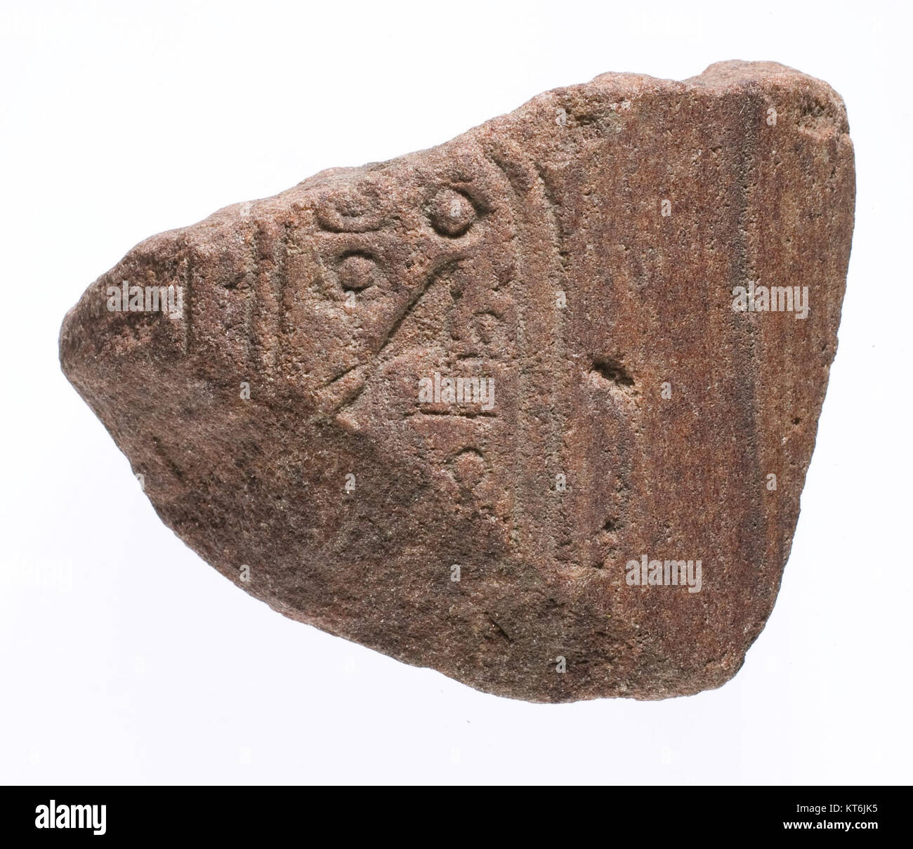 This artifact, featuring the arm of a figure with Aten cartouches, is a ...