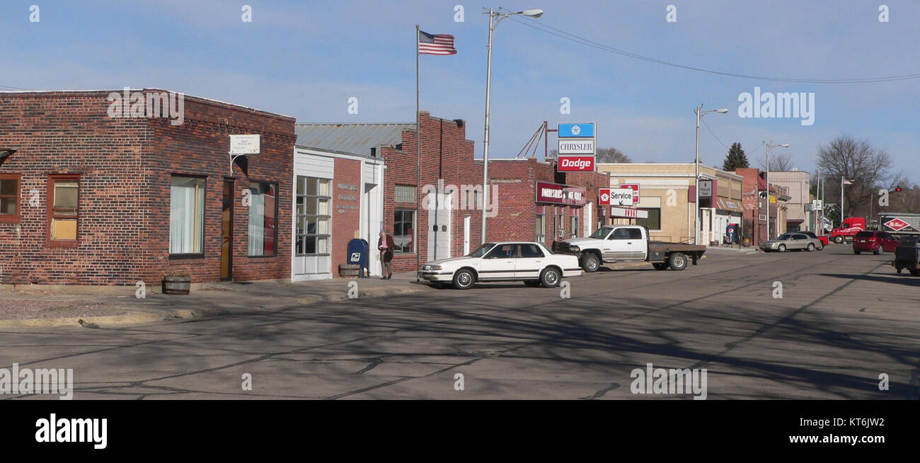 This photograph depicts Walnut Street in Arnold, Nebraska, focusing on ...