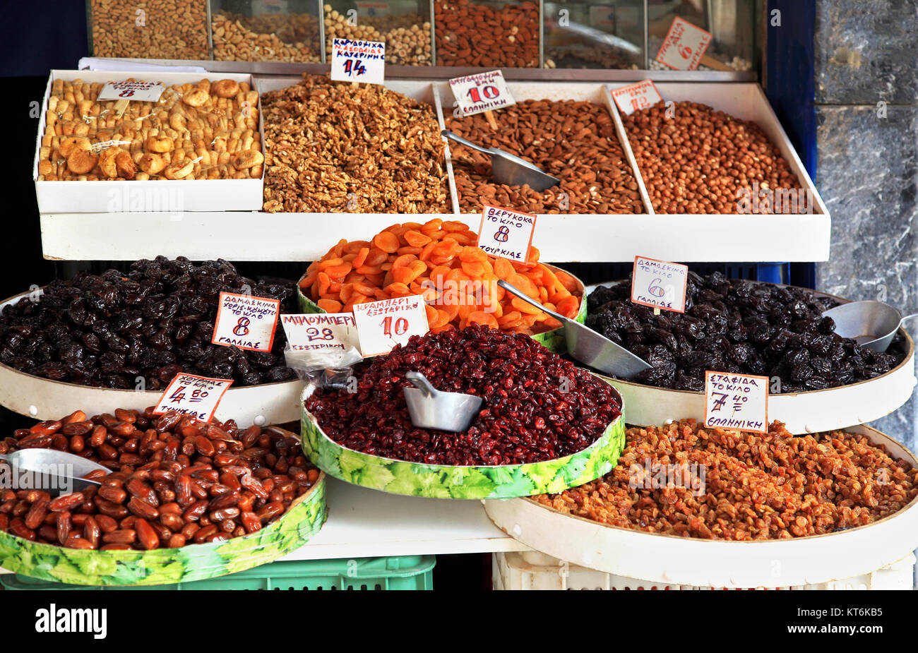 Organic dry fruits sold on market stall Stock Photo - Alamy