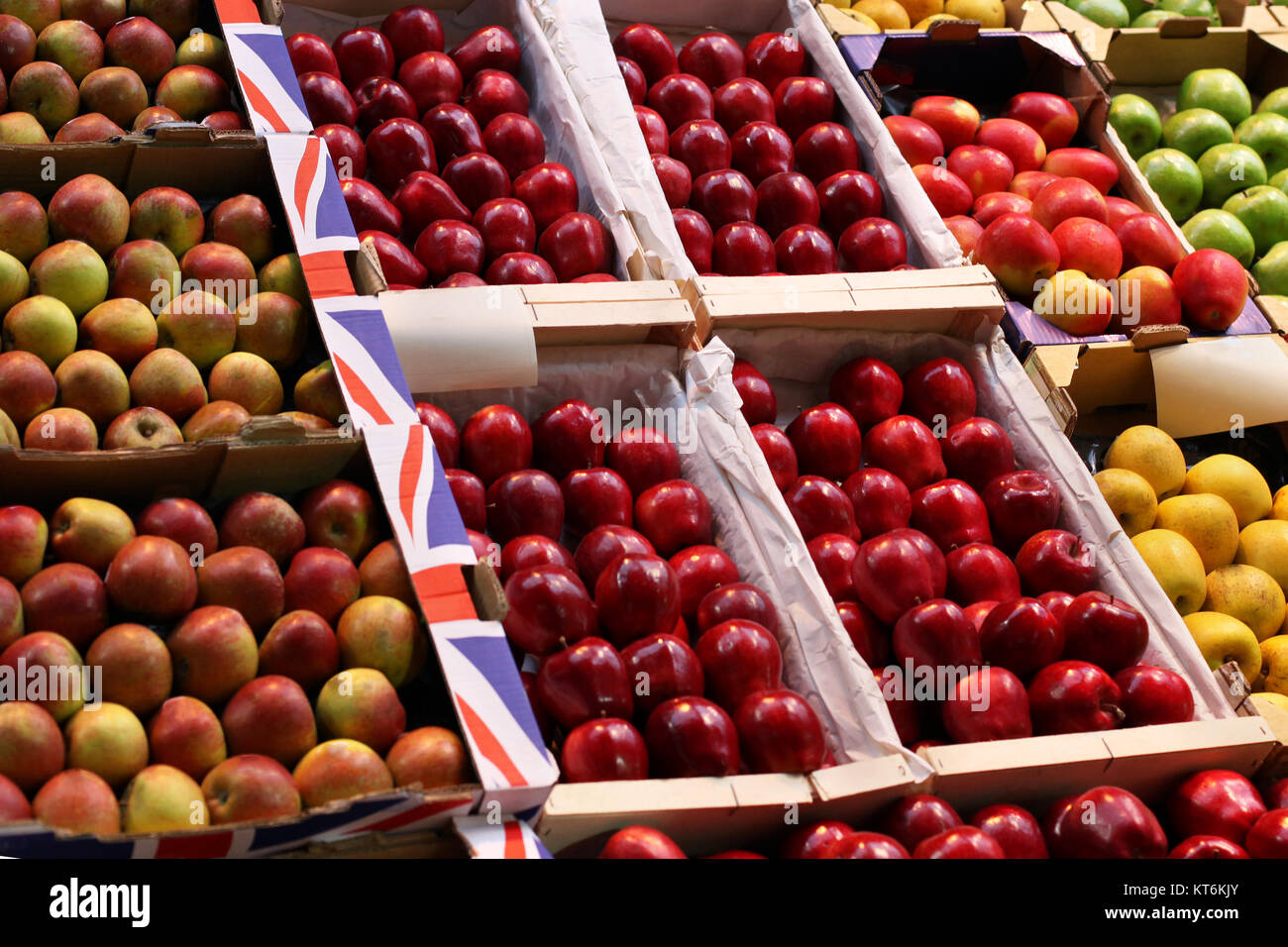 Large variety of organic apples in cardboard crates on market Stock ...
