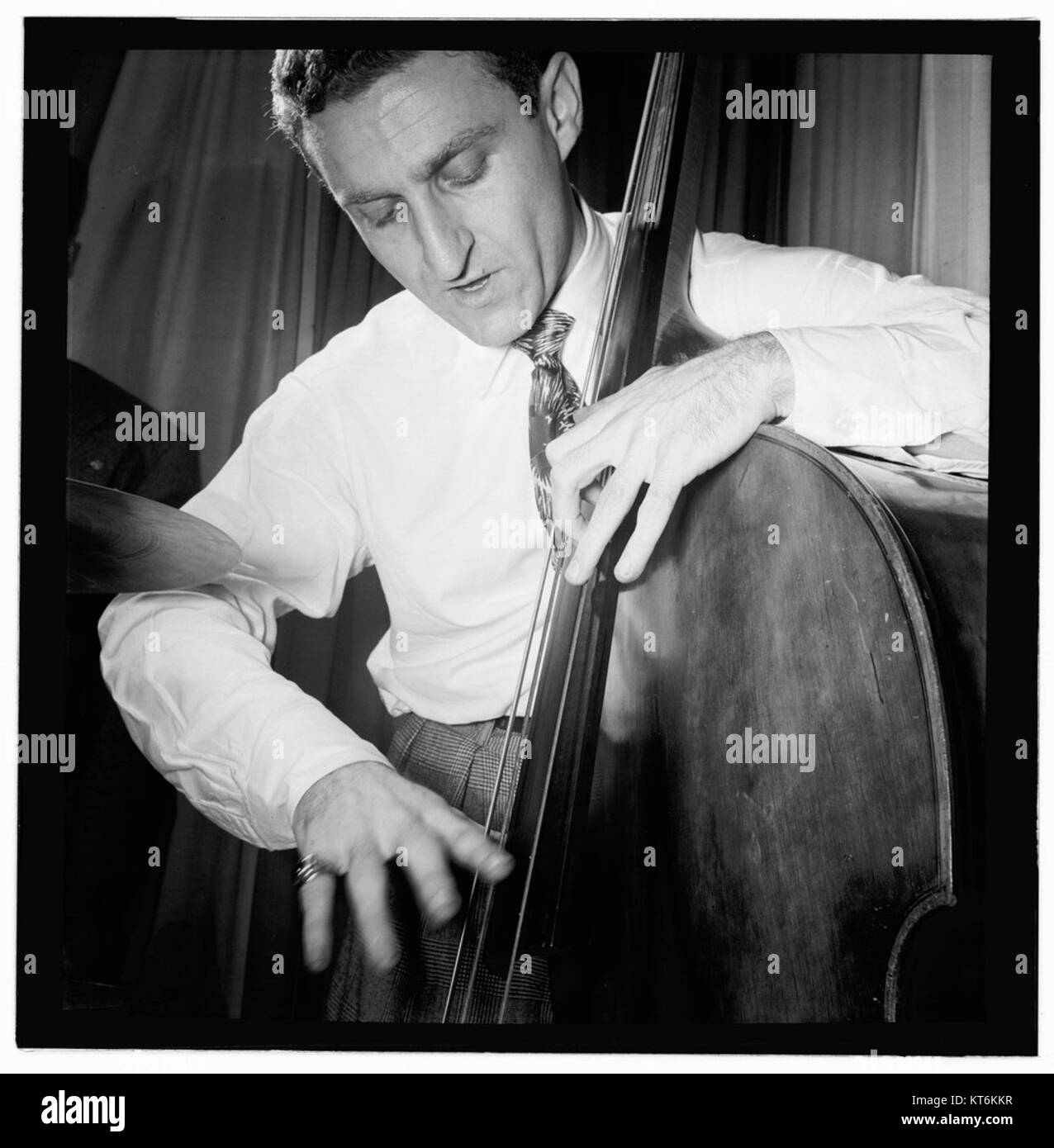 This portrait captures Jack Lesberg, a notable jazz bassist, at Eddie ...