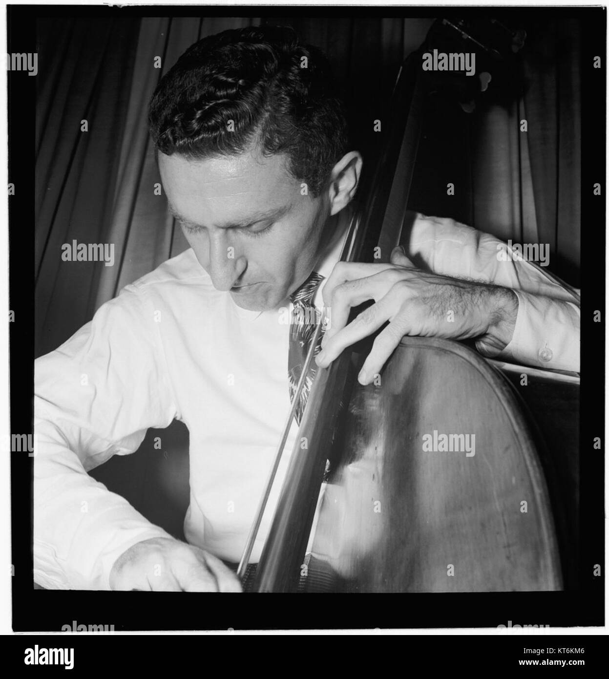 A portrait of jazz bassist Jack Lesberg, taken at Eddie Condon's club ...