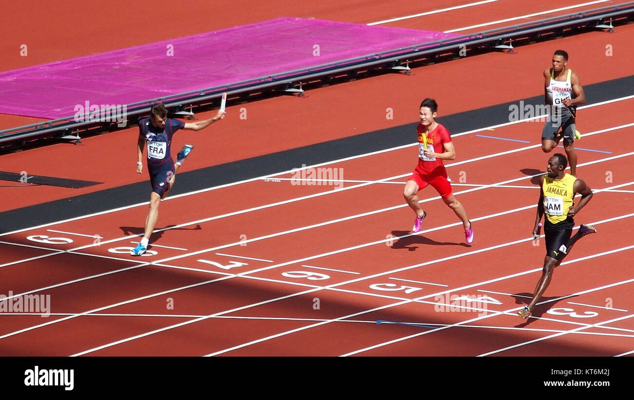 This image captures the moment from the 4x100m relay semifinal, where ...