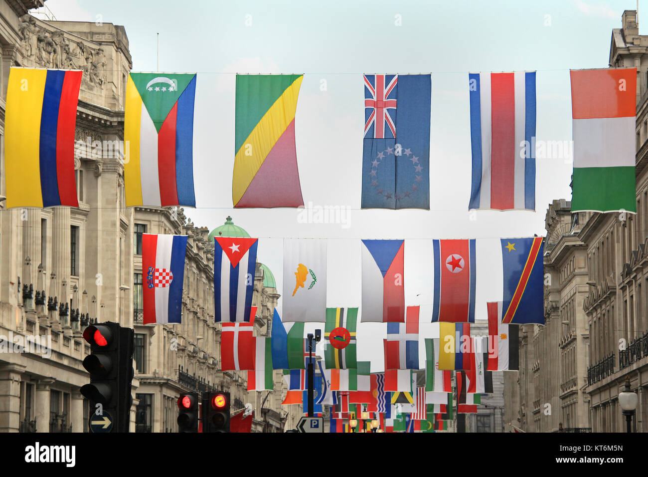 LONDON - JUNE 22: Bunch of international flags hanging on London Regent ...