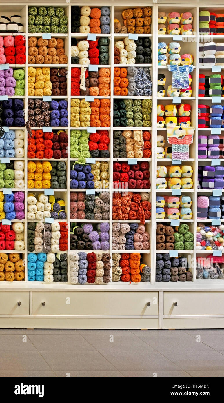 Knitting wool selection in craft store shelves Stock Photo - Alamy